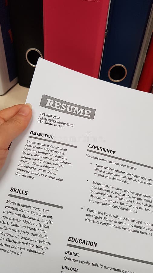 Hand Holding Resume during Interview Stock Image - Image of label ...