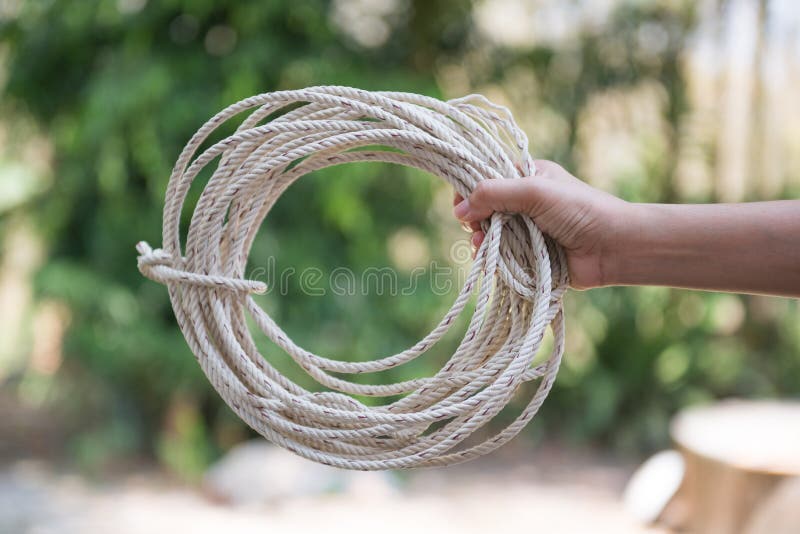 Hand Holding Rope for a Bundle Stock Image - Image of twist, bend: 49745465
