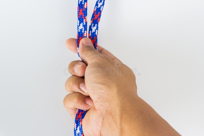 Hand holding rope stock photo. Image of rubber, pulling - 45307234