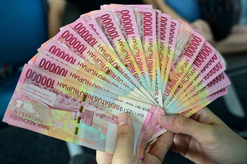 Rupiah - Indonesian Money with Purple Tape Stock Image - Image of ...