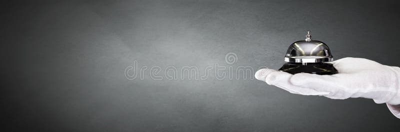 Hand Holding Service Bell stock photo. Image of service - 211303194