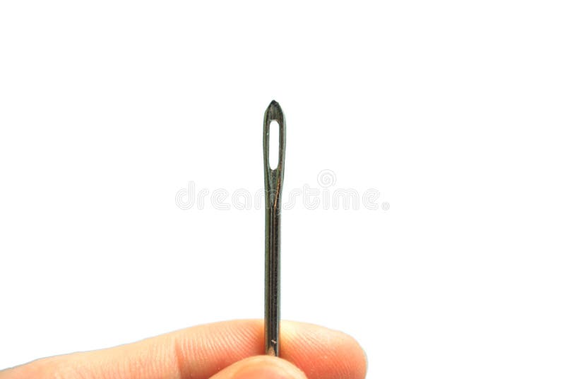 Hand Holding a Sewing Needle Stock Photo - Image of macro, needle: 28289314