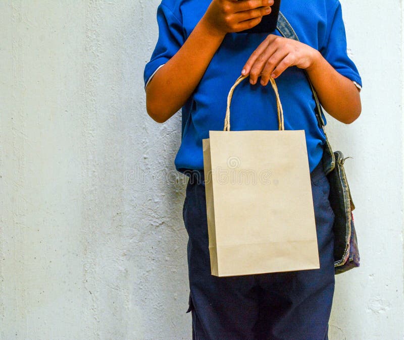 Hand Holding a Shopping Bag Isolated on White Stock Photo - Image of ...