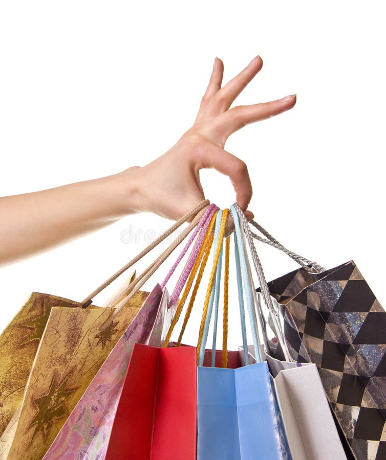 Hand holding shopping bags stock image. Image of carefree - 13754619