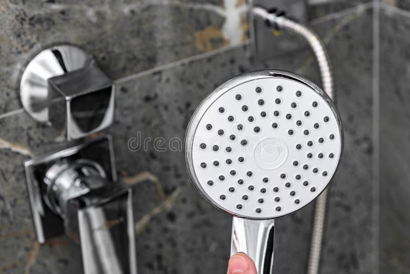 Hand Holding Plastic Crosses for Laying Ceramic Tiles. Stock Photo ...
