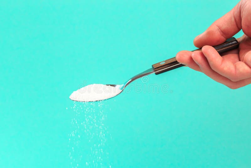 Hand Holding a Silver Spoon with Sugar - Image Stock Photo - Image of ...