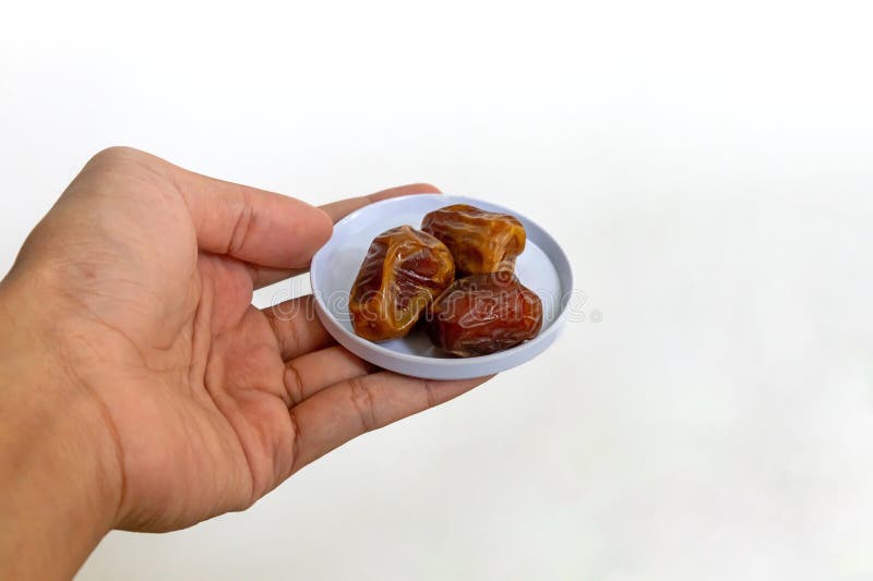 Hand Holding Small Plate Dates Fruit Stock Photos - Free & Royalty-Free ...