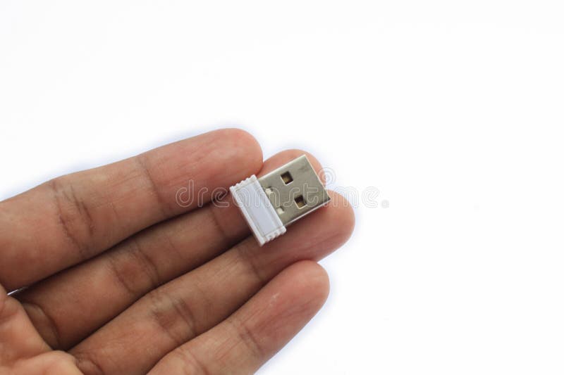 Hand Holding Small USB Flash Drive Isolated on a White Background Stock ...