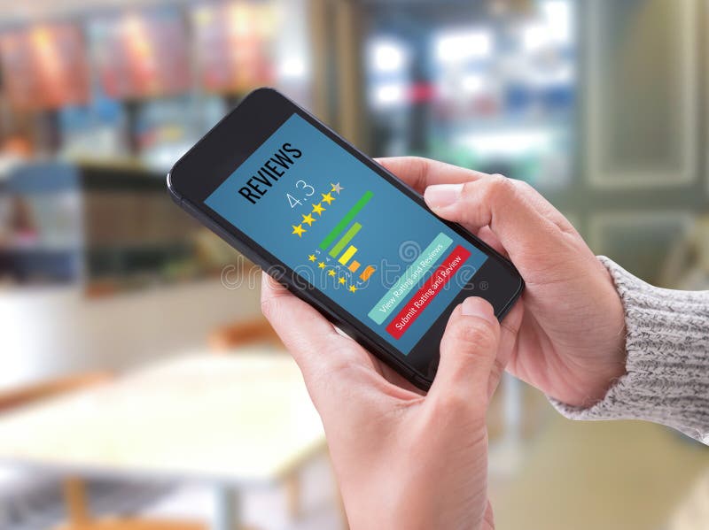 Hand Holding Smart Phone Review Check Customer Satisfaction. Stock ...