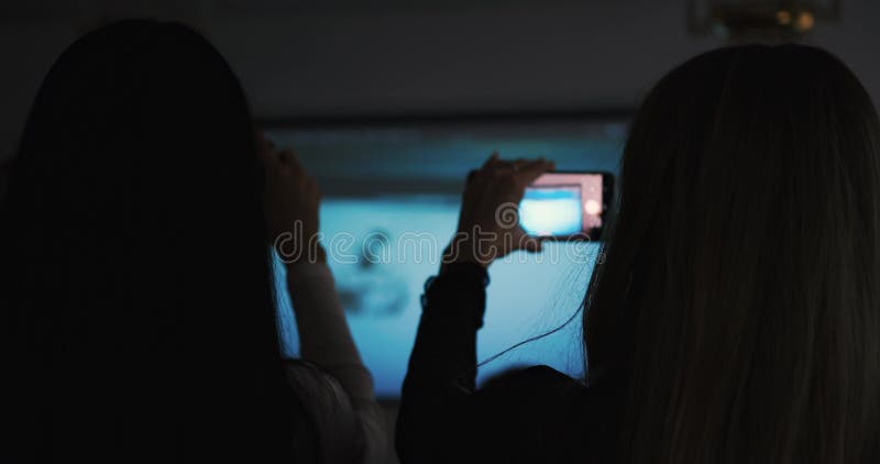 Hand Holding Smartphone Capturing Projection on Screen during Lecture ...