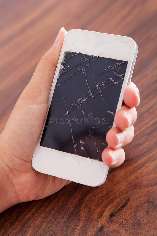 Hand Holding Smartphone with Cracked Screen Stock Image - Image of ...