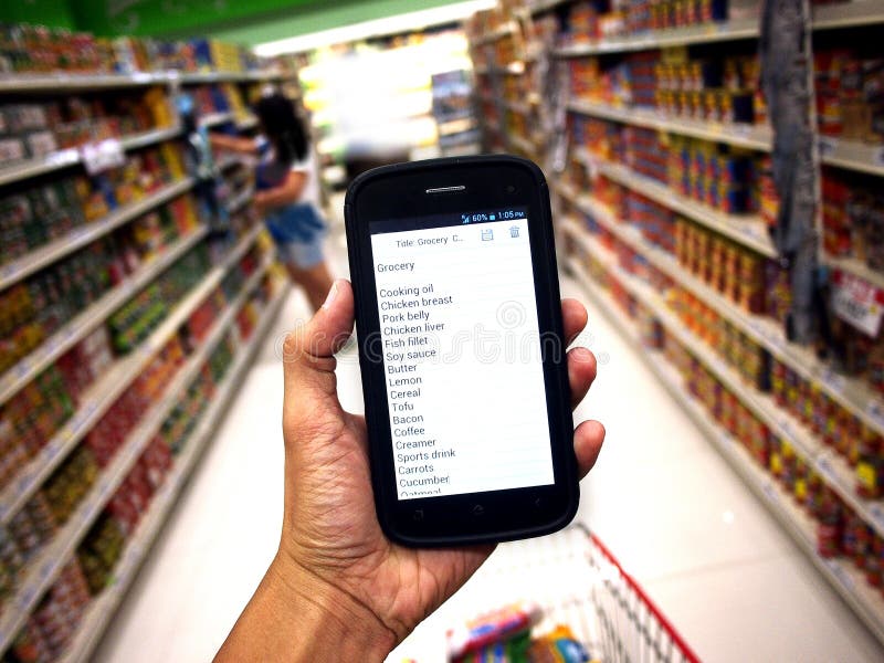 Hand Holding a Smartphone with Grocery List Stock Photo - Image of ...
