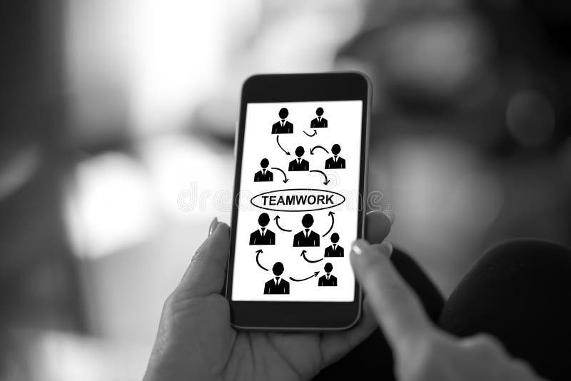 Teamwork Concept on a Smartphone Stock Photo - Image of held ...