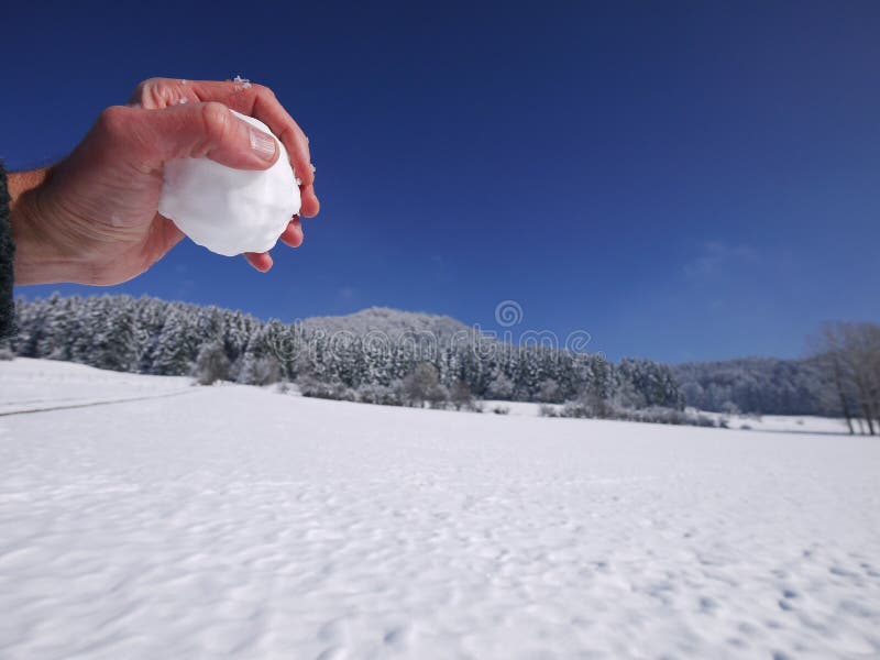 Hand holding snow ball stock image. Image of holiday - 108011129