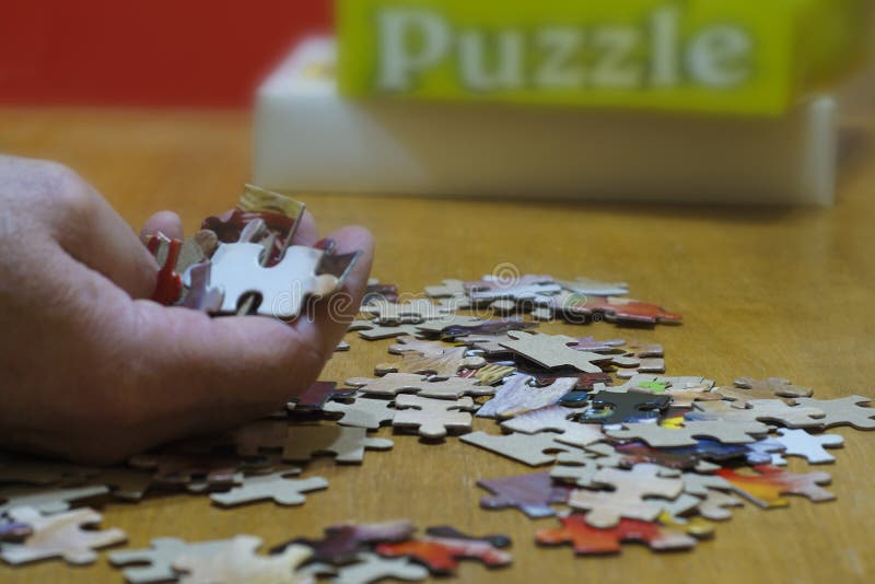 Hand Playing with Puzzle Pieces Stock Image - Image of hand, human ...
