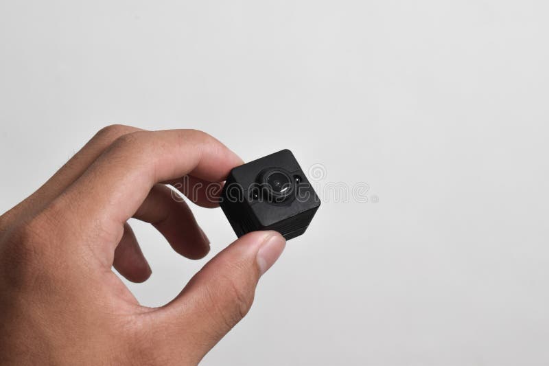 Hand Holding a Spy Camera, Black Security Camera Stock Photo - Image of ...