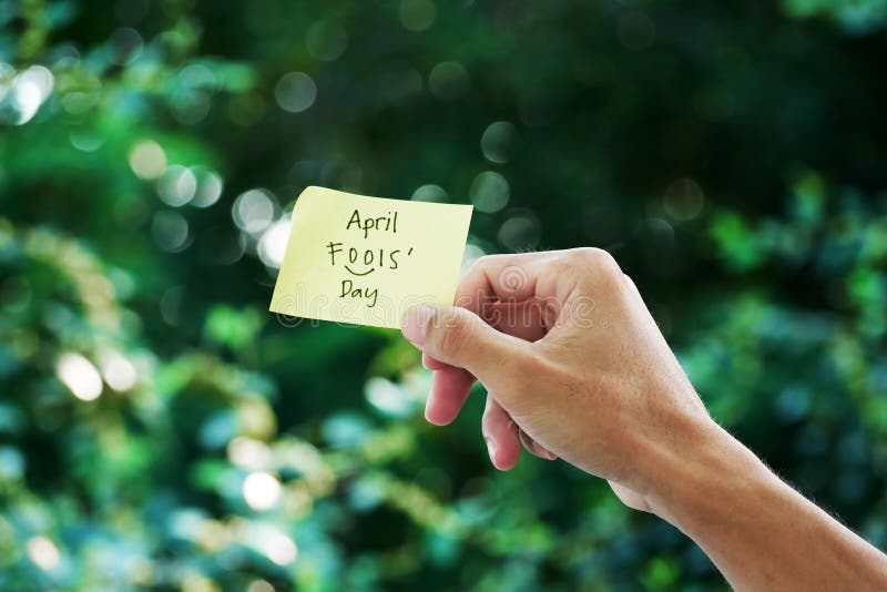 Hand Holding a Stick Note with April Fools Day Text. Stock Photo ...