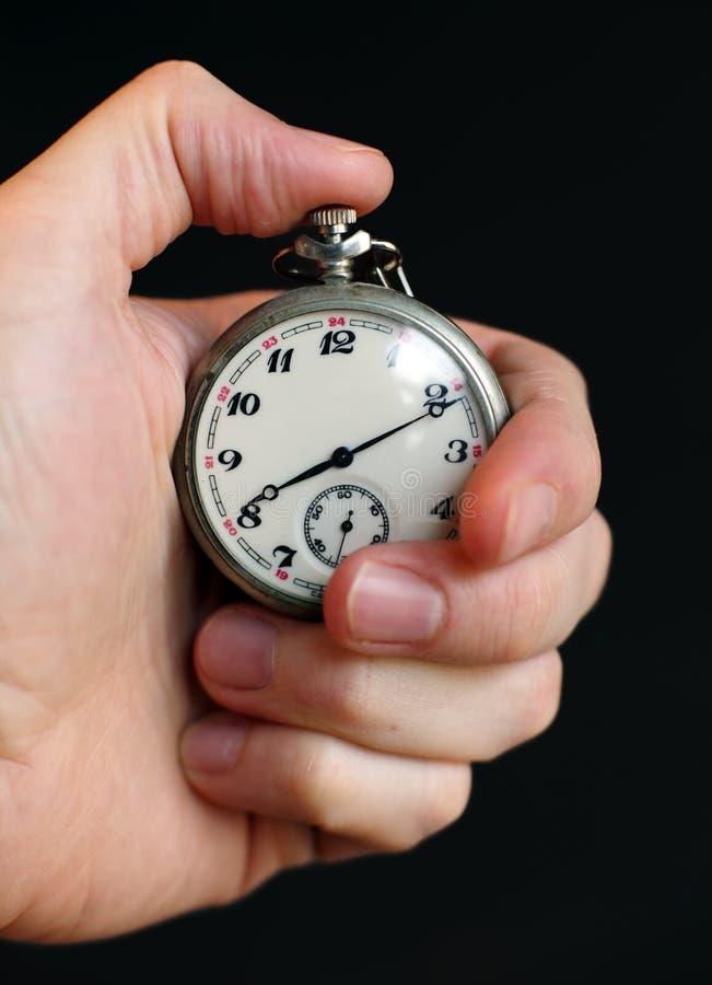 Hand holding a stop watch stock photo. Image of clock - 18230186