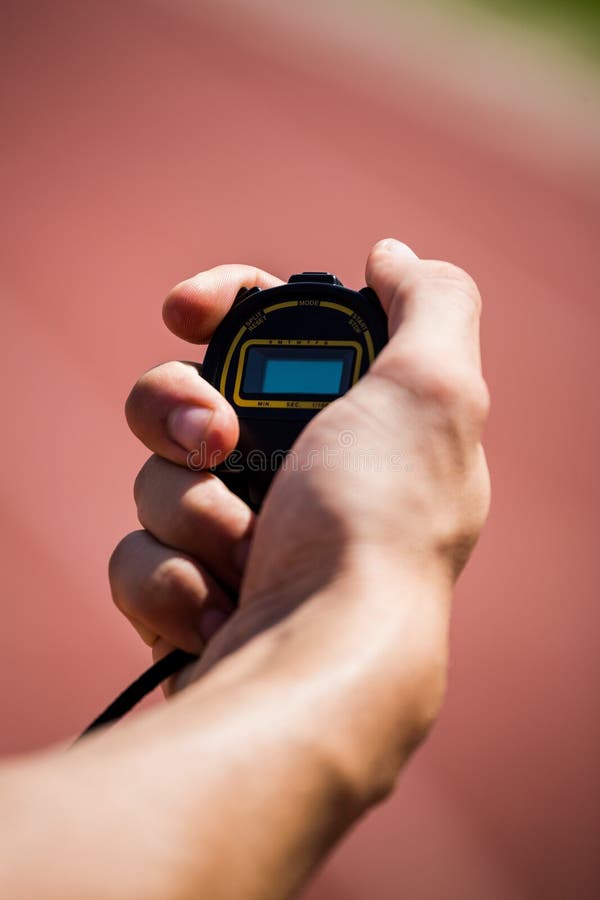 Hand Timing a Womans Run on the Running Track Stock Photo - Image of ...