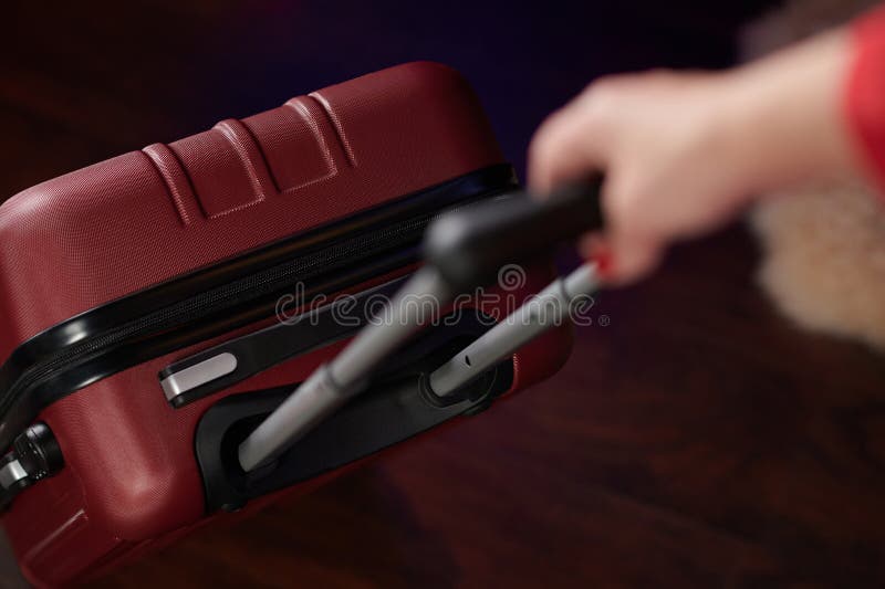 Hand Holding a Suitcase Luggage Shallow Depth of Field Focus on Hand ...
