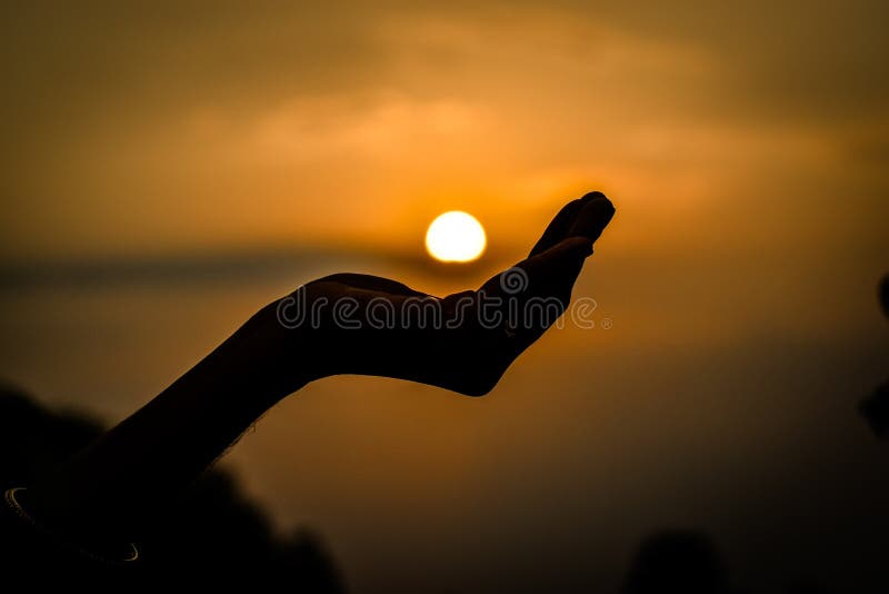 Hand holding sun stock photo. Image of holding, hand - 91784732