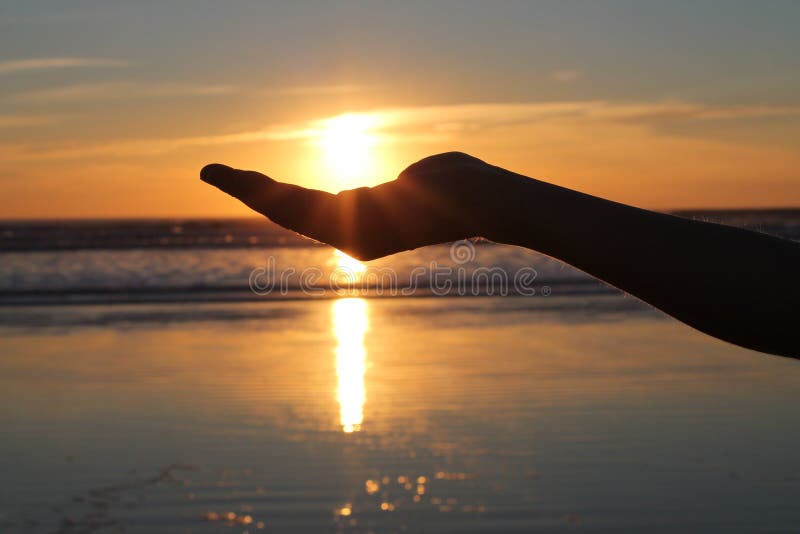 Man Holding the Sun stock image. Image of lifestyle, gold - 29678775