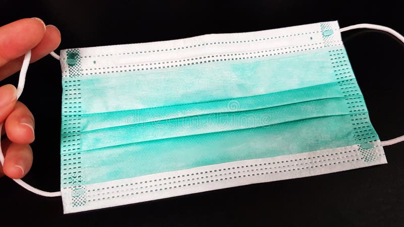 A Hand Holding a Surgical Mask Stock Image - Image of medical, healthy ...