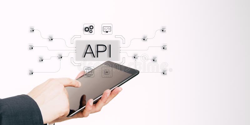 Hand Holding Tablet with API Concept and Digital Connections in ...