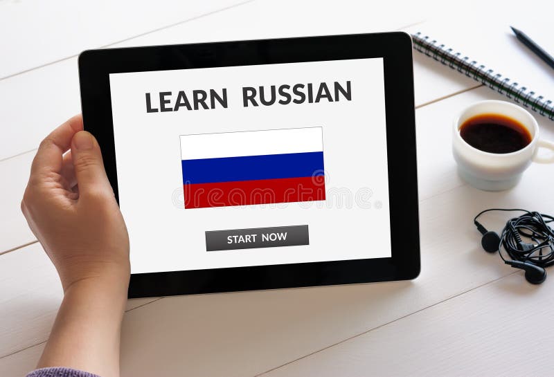 Hand Holding Tablet with Learn Russian Concept on Screen Stock Image ...