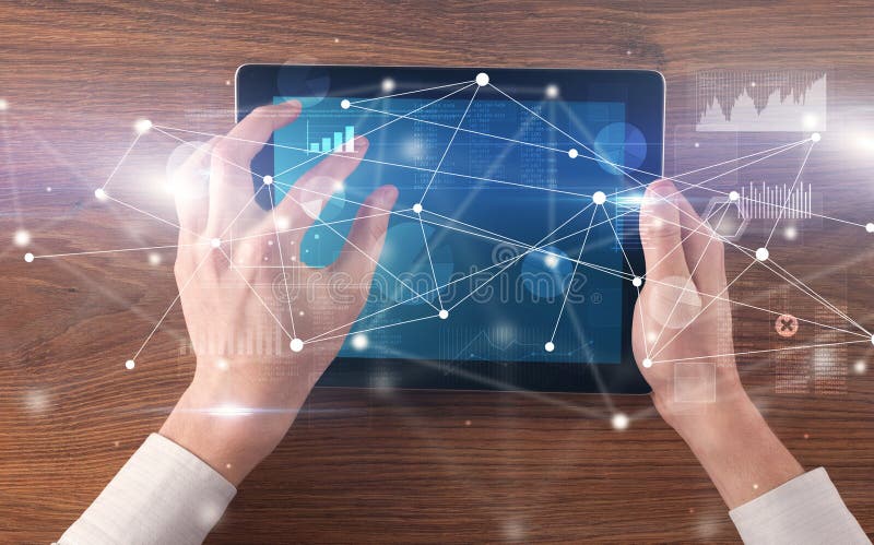 Hand Holding Tablet with Linked Graphs and Charts Concept Stock Photo ...