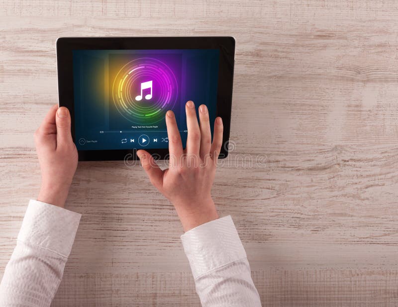 Hand Holding Tablet with Music Play Concept Stock Photo - Image of ...