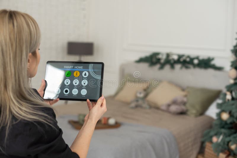 Hand Holding a Tablet with Smart Home System Applications Stock Image ...