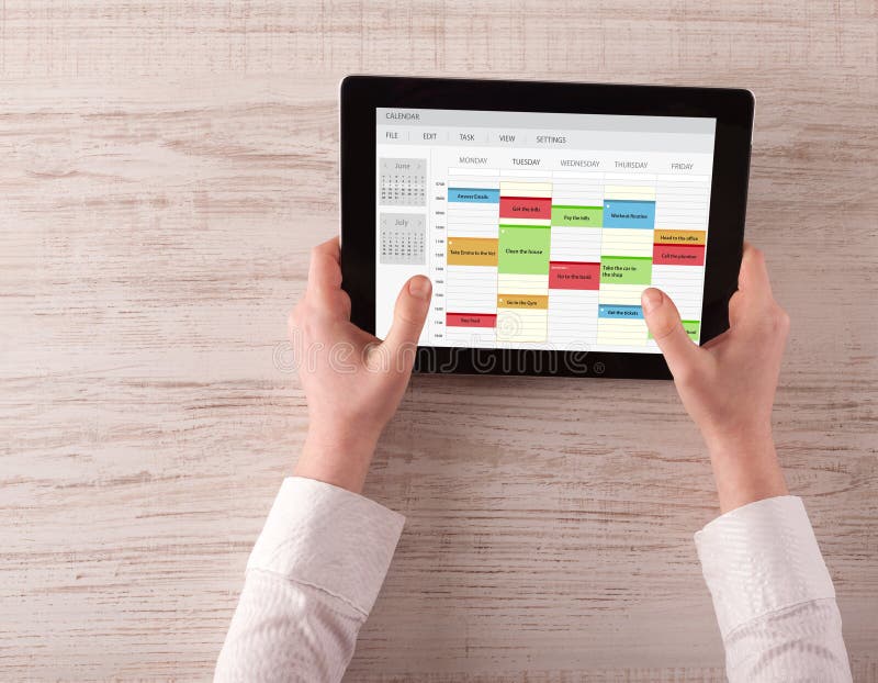Hand Holding Tablet with Timetable Concept Stock Photo - Image of hour ...