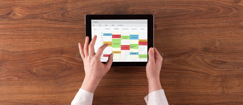 Hand Holding Tablet with Timetable Concept Stock Image - Image of hour ...