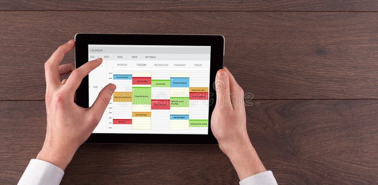 Hand Holding Tablet with Timetable Concept Stock Image - Image of ...