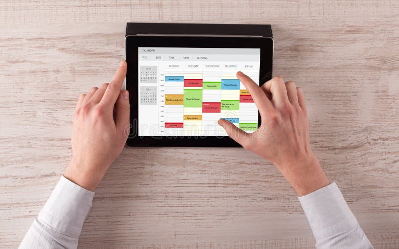 Hand Holding Tablet with Timetable Concept Stock Photo - Image of ...