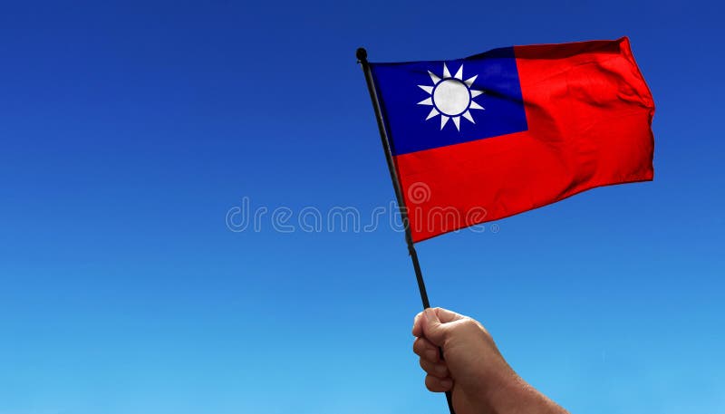 Hand Holding Taiwan Flag Waving Under Cloudy Sky. Stock Photo - Image ...