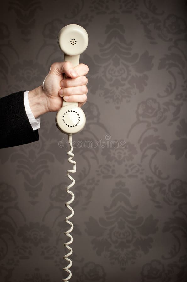 Hand holding telephone stock image. Image of receiver - 31304809