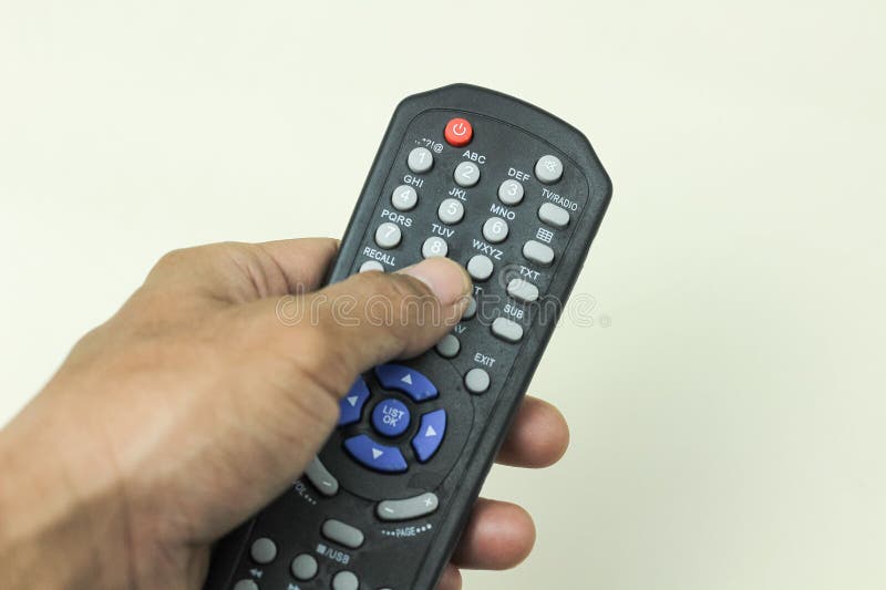 Hand Holding Television Remote Control on White Background. Close Up ...