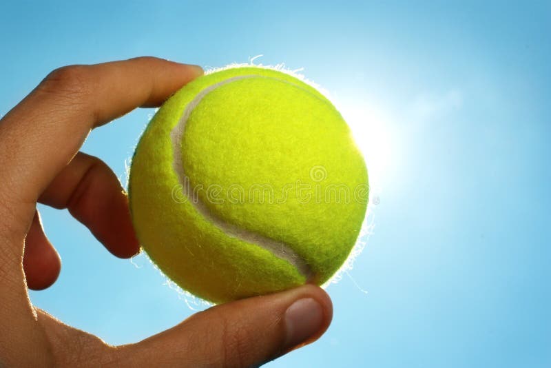 Hand Holding Tennis Ball Up To the Sky Stock Image - Image of detail ...