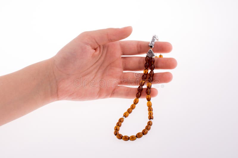 Hand holding a tespih stock photo. Image of tespih, jewelry - 119269098