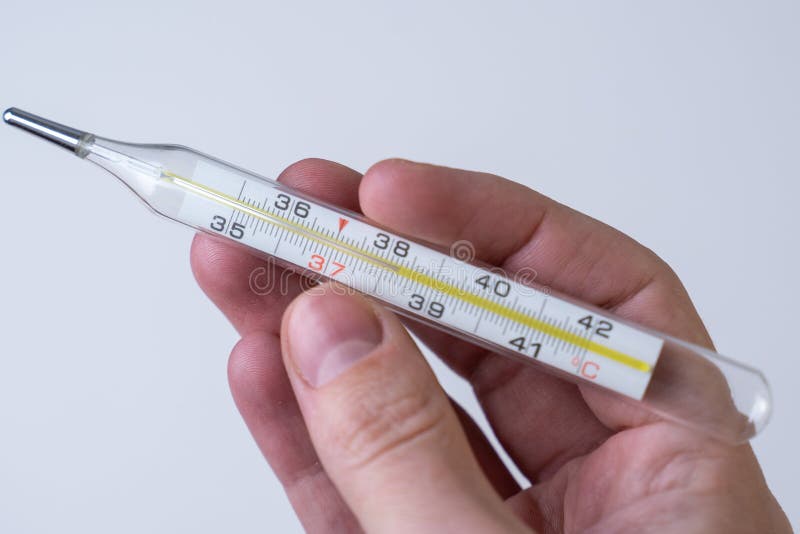 A Hand Holding Thermometer Showing High Body Temperature Stock Photo ...