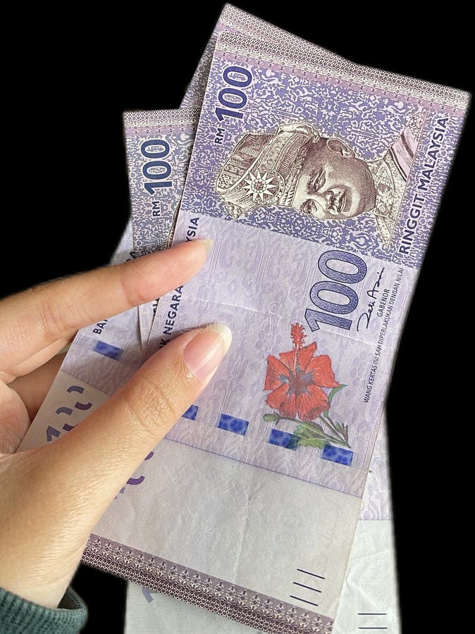 Hand Holding Three RM100 Malaysian Ringgit Banknotes Stock Image ...