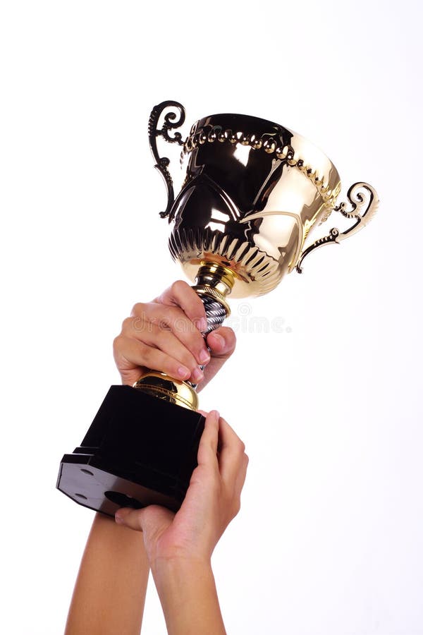 A hand holding a throphy stock image. Image of metallic - 77294053