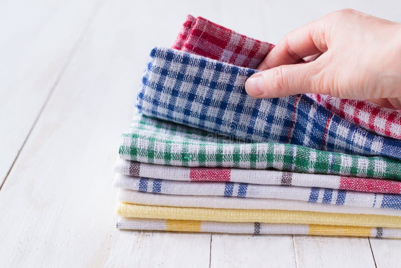 Hand holding towels stock image. Image of cotton, textile - 175647139