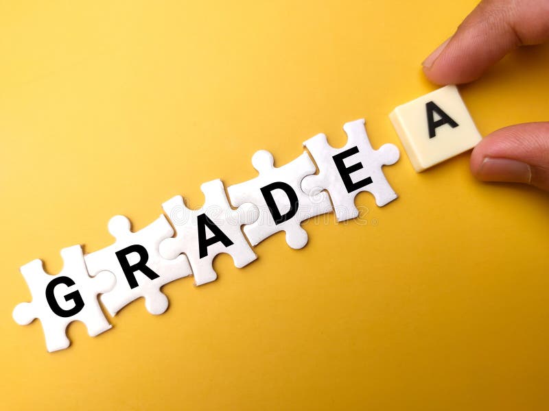 White Puzzle with the Word GRADE a. Stock Image - Image of pass ...