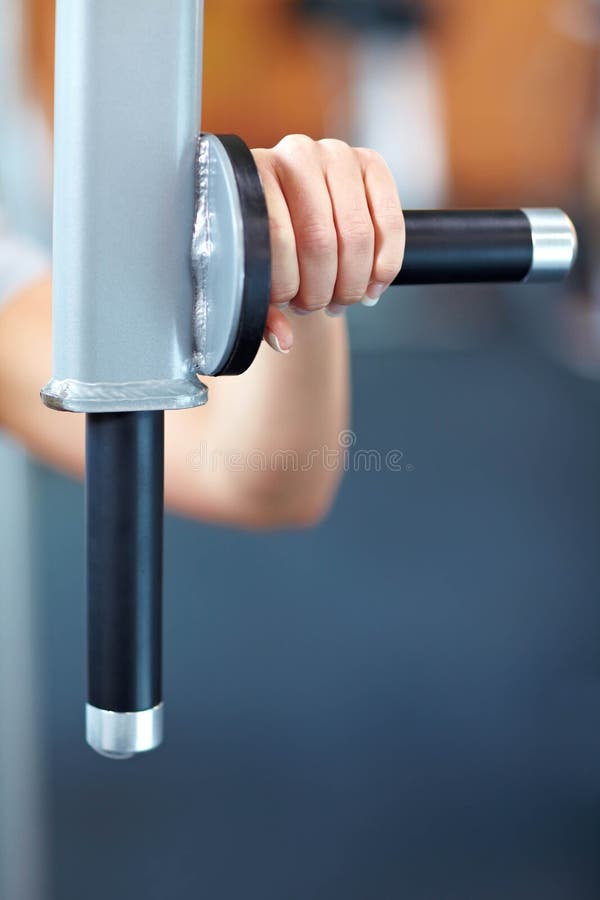 Hand Holding Training Machine Stock Photo - Image of health, people ...