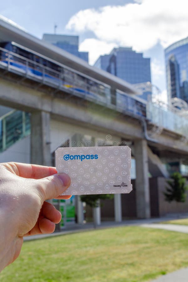 Hand Holding a Translink Compass Card Editorial Photo - Image of ...
