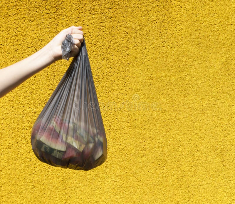 Hand Holding Trash, Waste, Trash Recycle Bag with Garbage Stock Photo ...