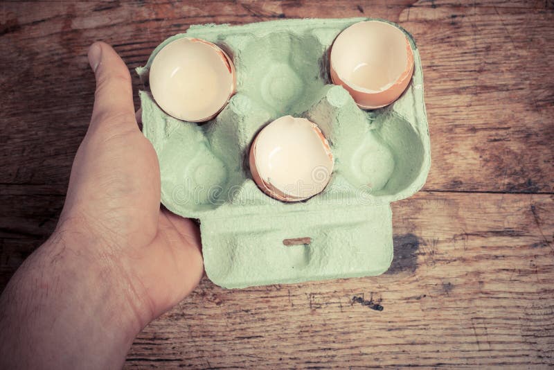 Hand Holding a Tray of Egg Shells Stock Photo - Image of cooking ...